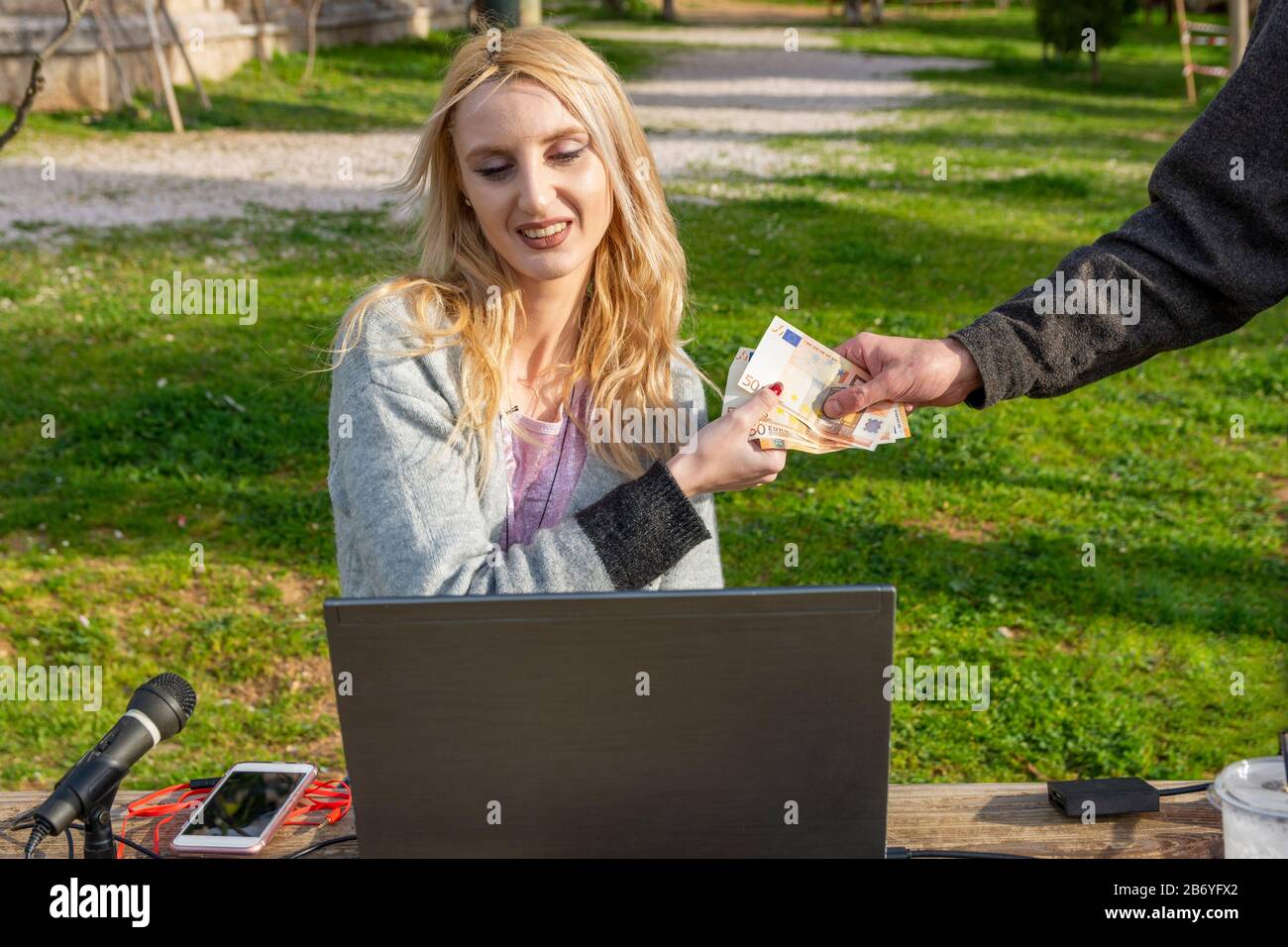 Girl receiving money hi-res stock photography and images - Alamy