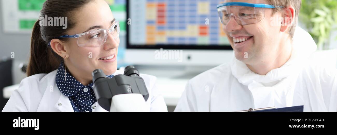 Fun teamwork in modern lab Stock Photo - Alamy