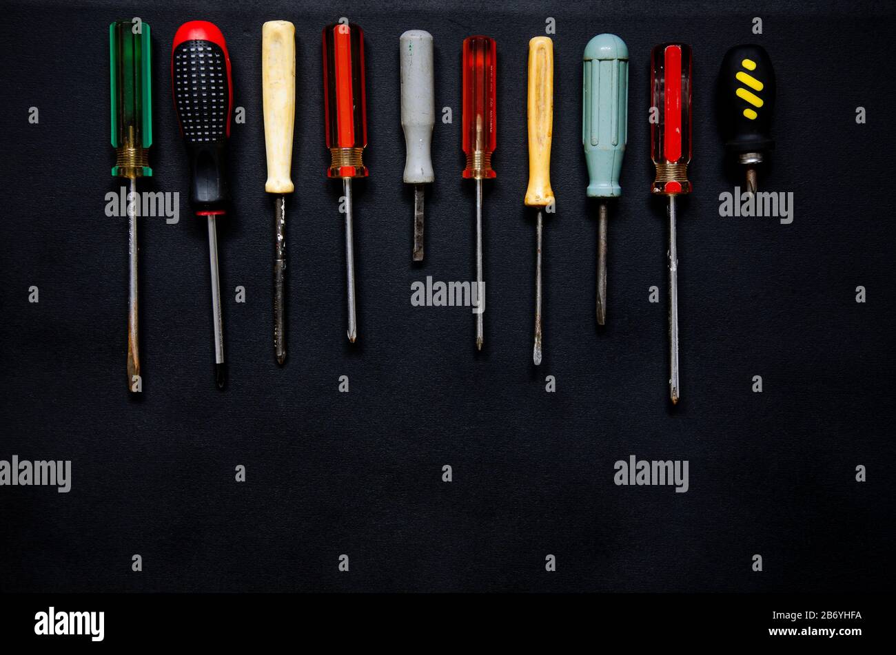 Screwdrivers of different shapes, sizes and colors for repair and ...