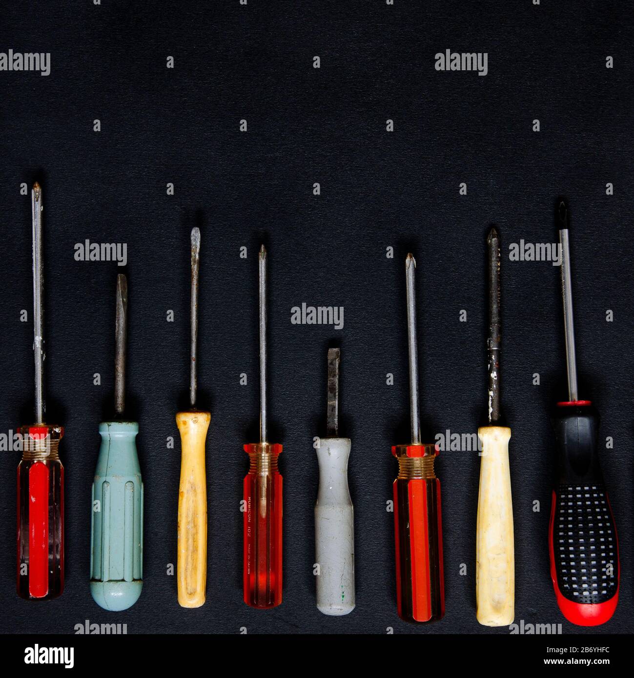 Screwdrivers of different shapes, sizes and colors for repair and ...