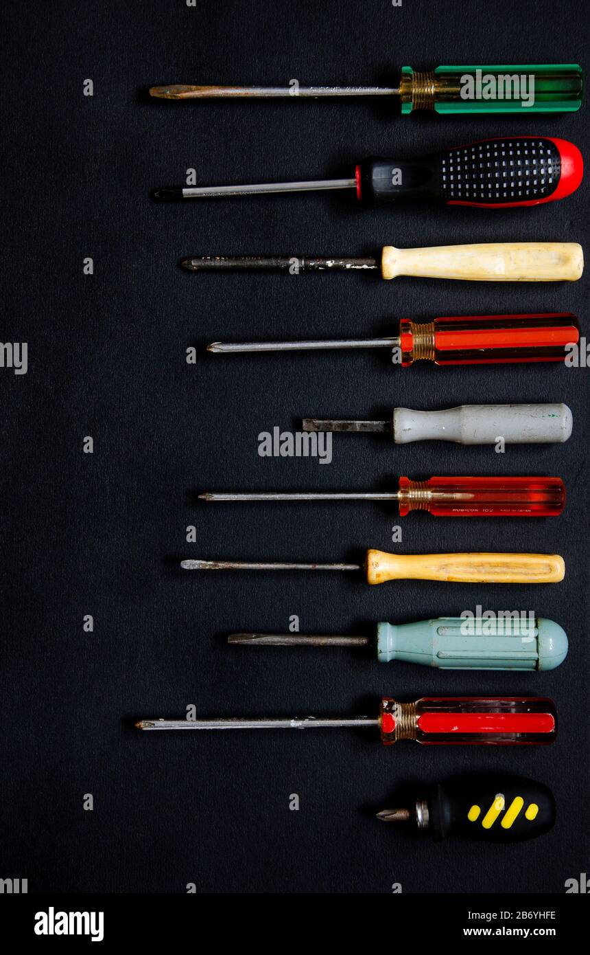 Screwdrivers of different shapes, sizes and colors for repair and ...