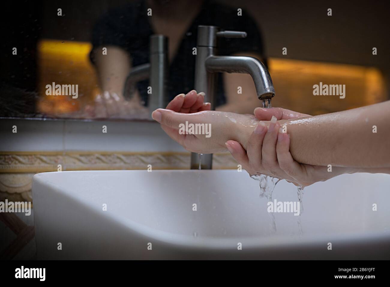 Handwashing in sink hi-res stock photography and images - Alamy