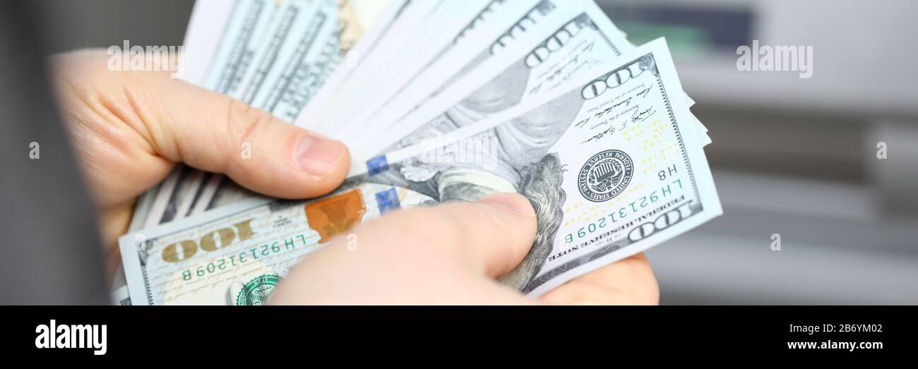 Male hands counting stack banknotes hi-res stock photography and images ...