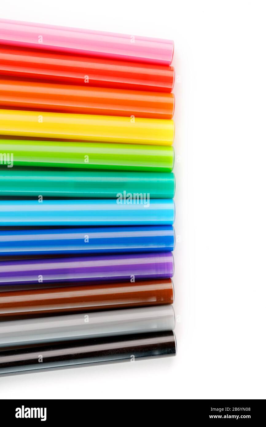 Multi-colored felt-tip pens, markers on a white isolated background ...