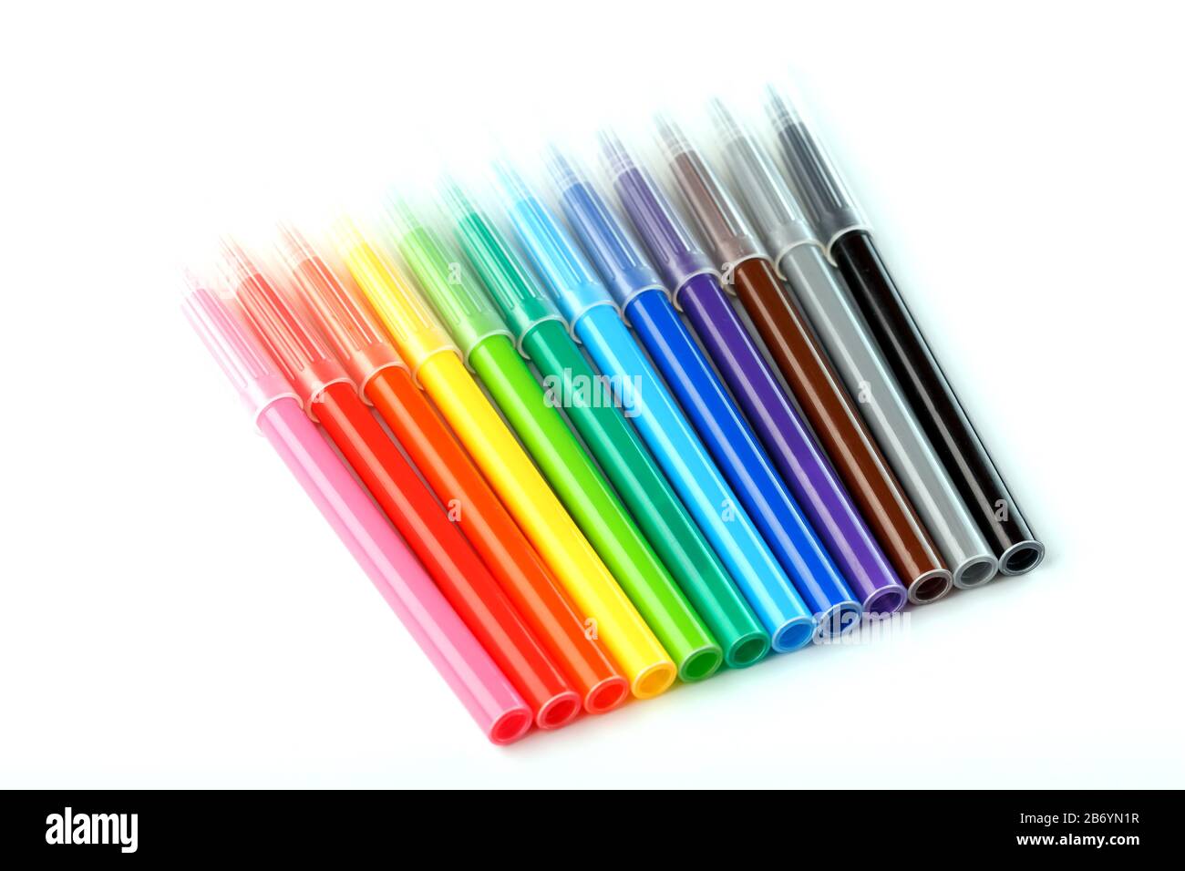 Multi-colored felt-tip pens, markers on a white isolated background ...