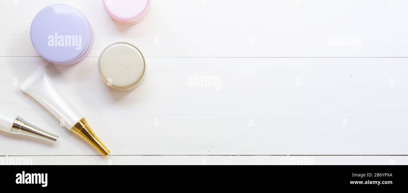 cosmetic and skin care product on white wood table, beauty with ...