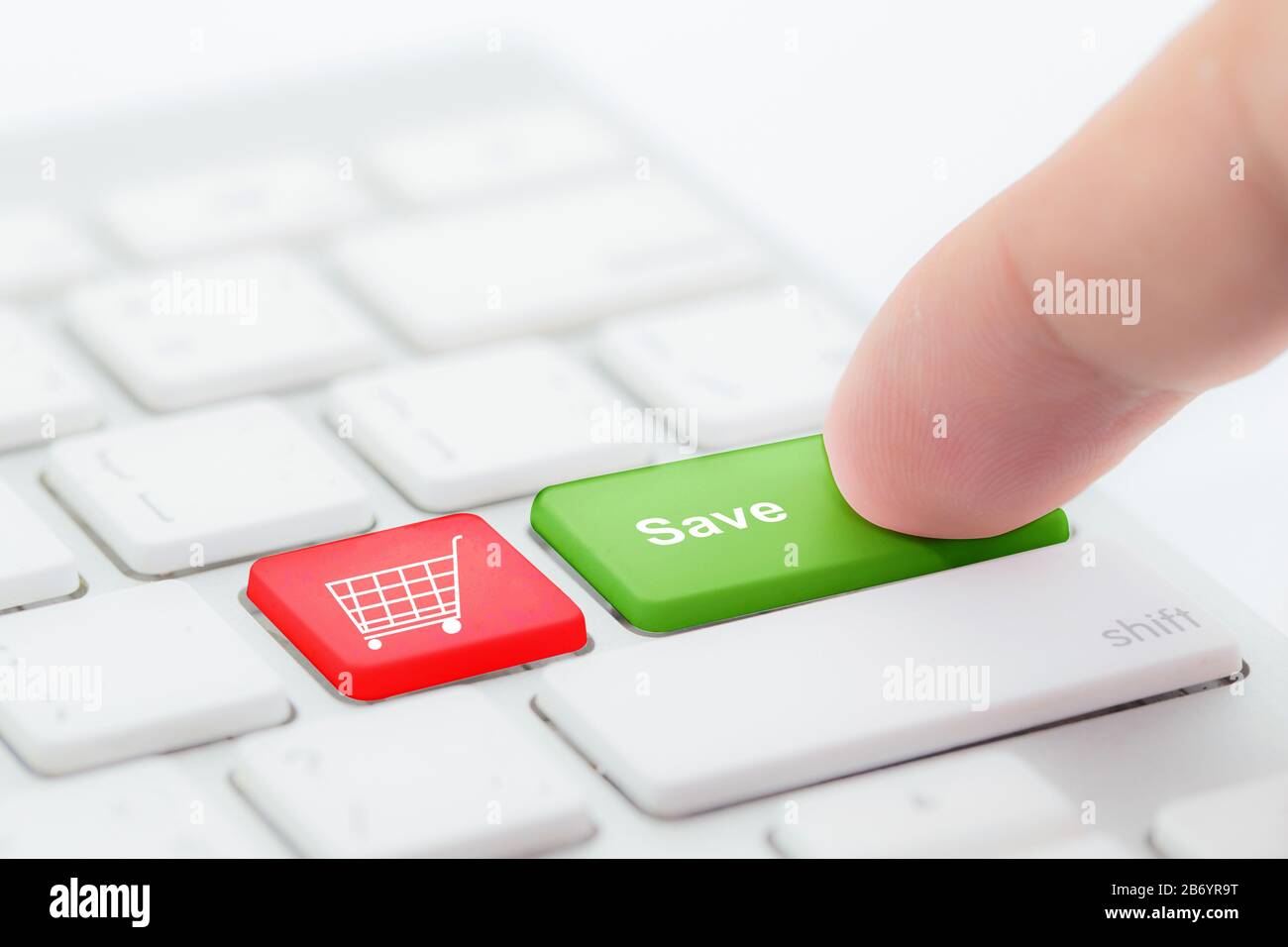 Hand pushing go green button with save on keyboard business concept ...
