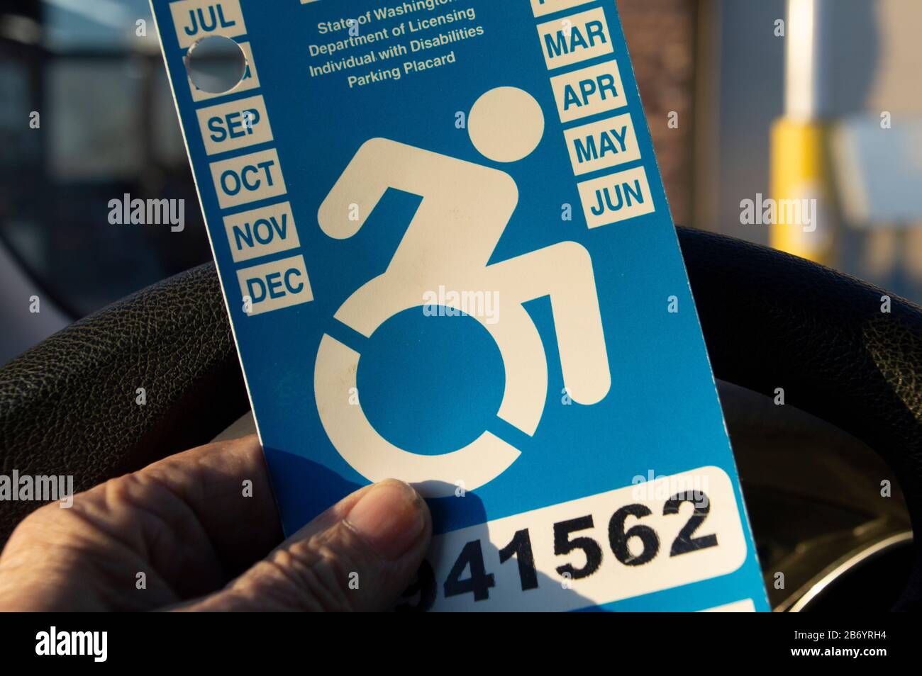 Handicap parking sticker Stock Photo - Alamy
