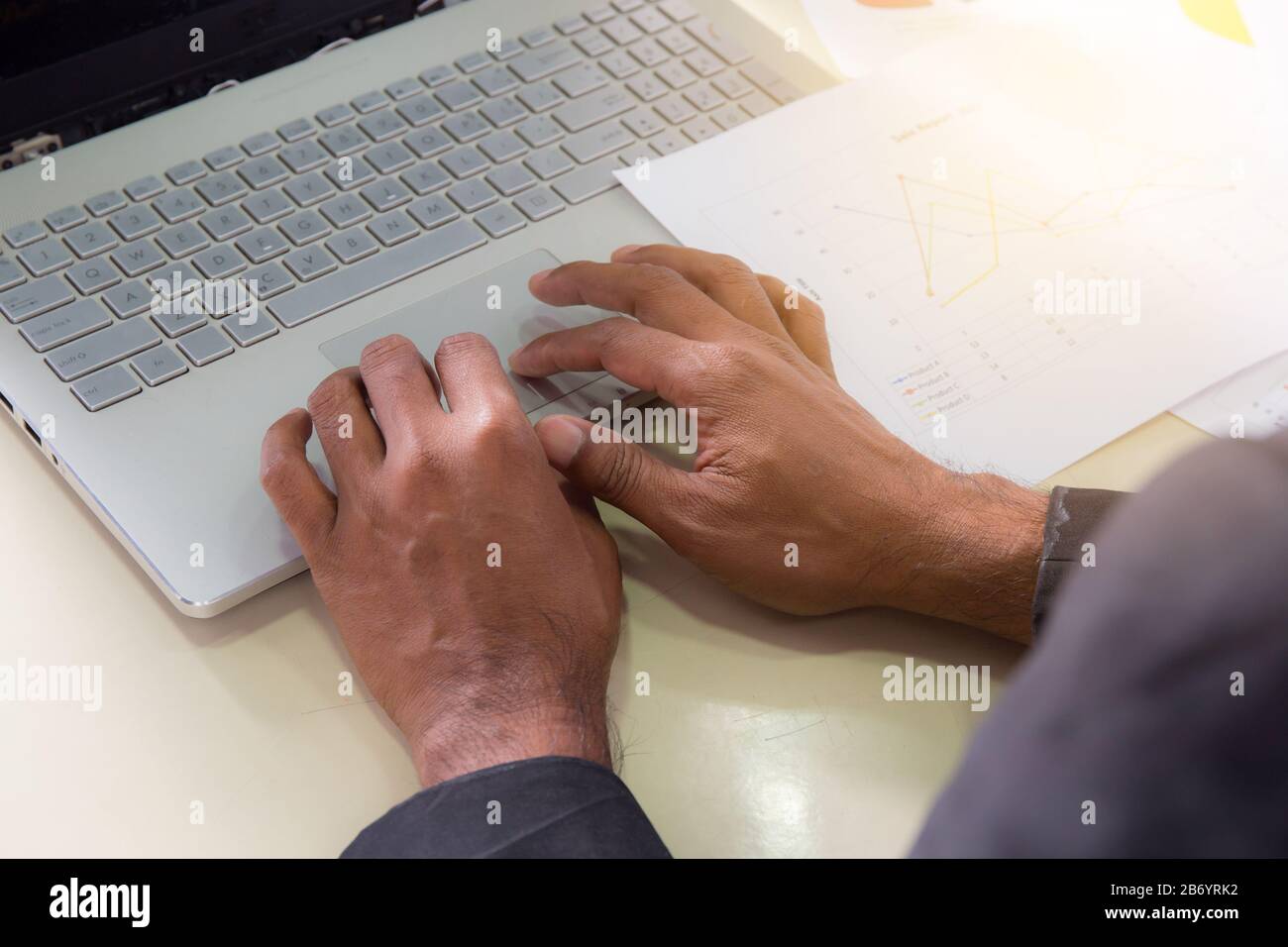 Office desk with business hand working on computer notebook Stock Photo ...