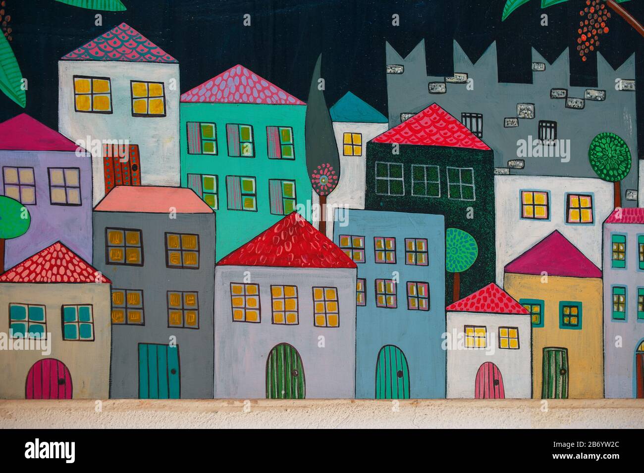 Drawing on the wall of colorful houses in the old center of Marmaris ...