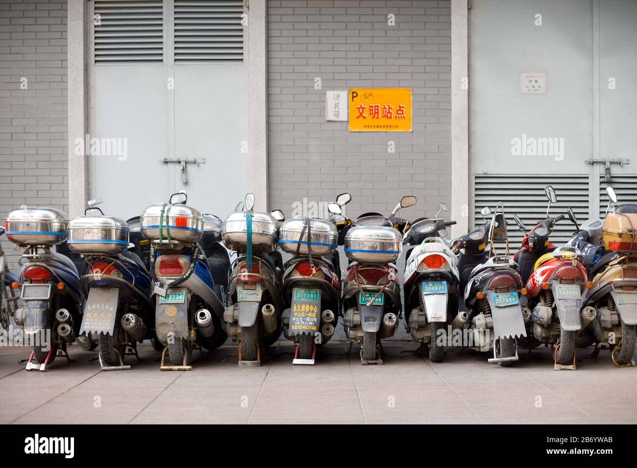 Shanghai, China - Motorcycles at a parking zone in downtown Stock Photo ...