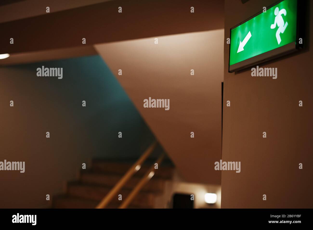 Corridor with exit sign in a hotel hi-res stock photography and images ...