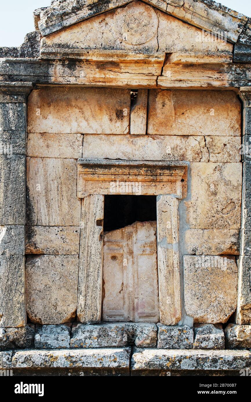 The front part of the crypt with the front door, the tomb in a large ...