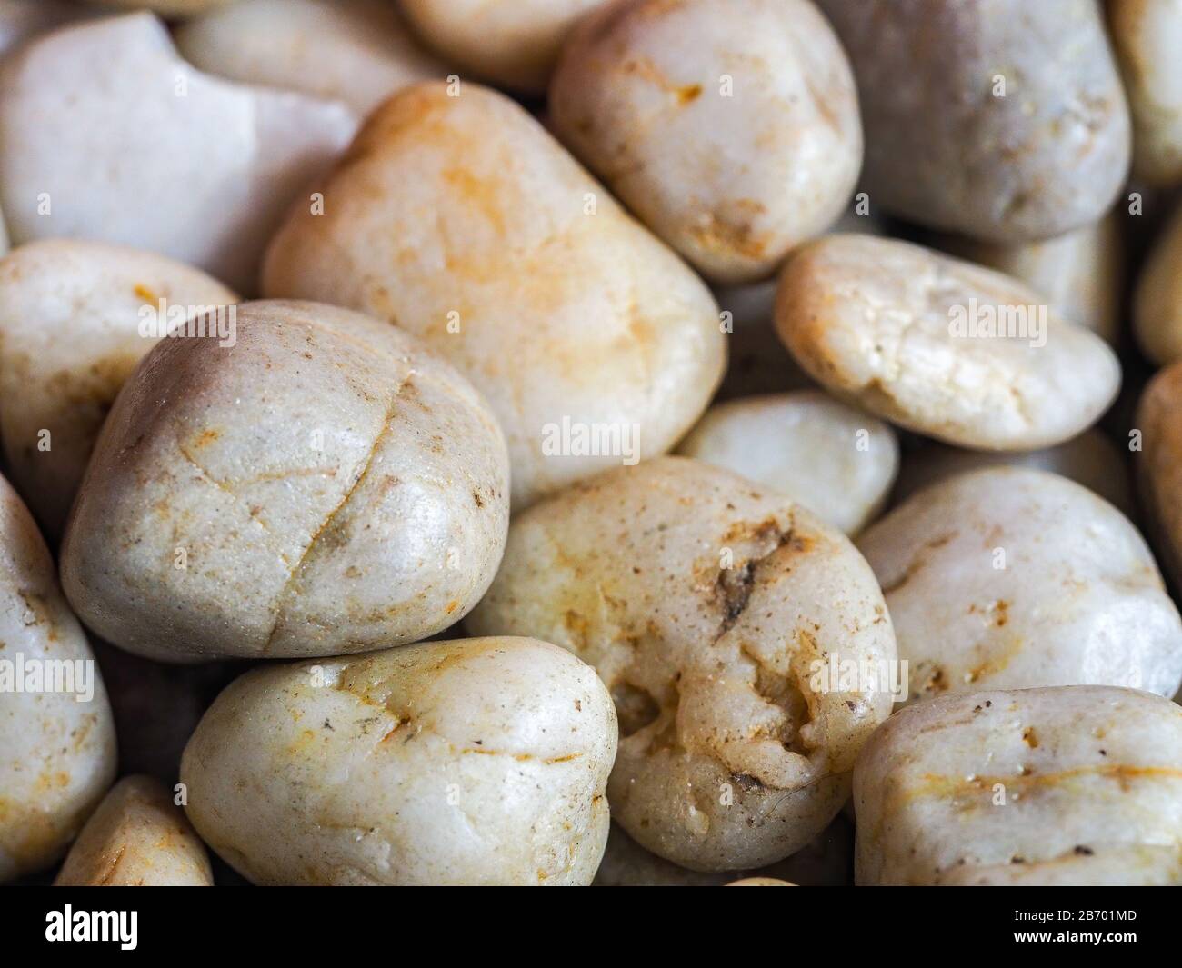 smooth tan stones closeup Stock Photo - Alamy
