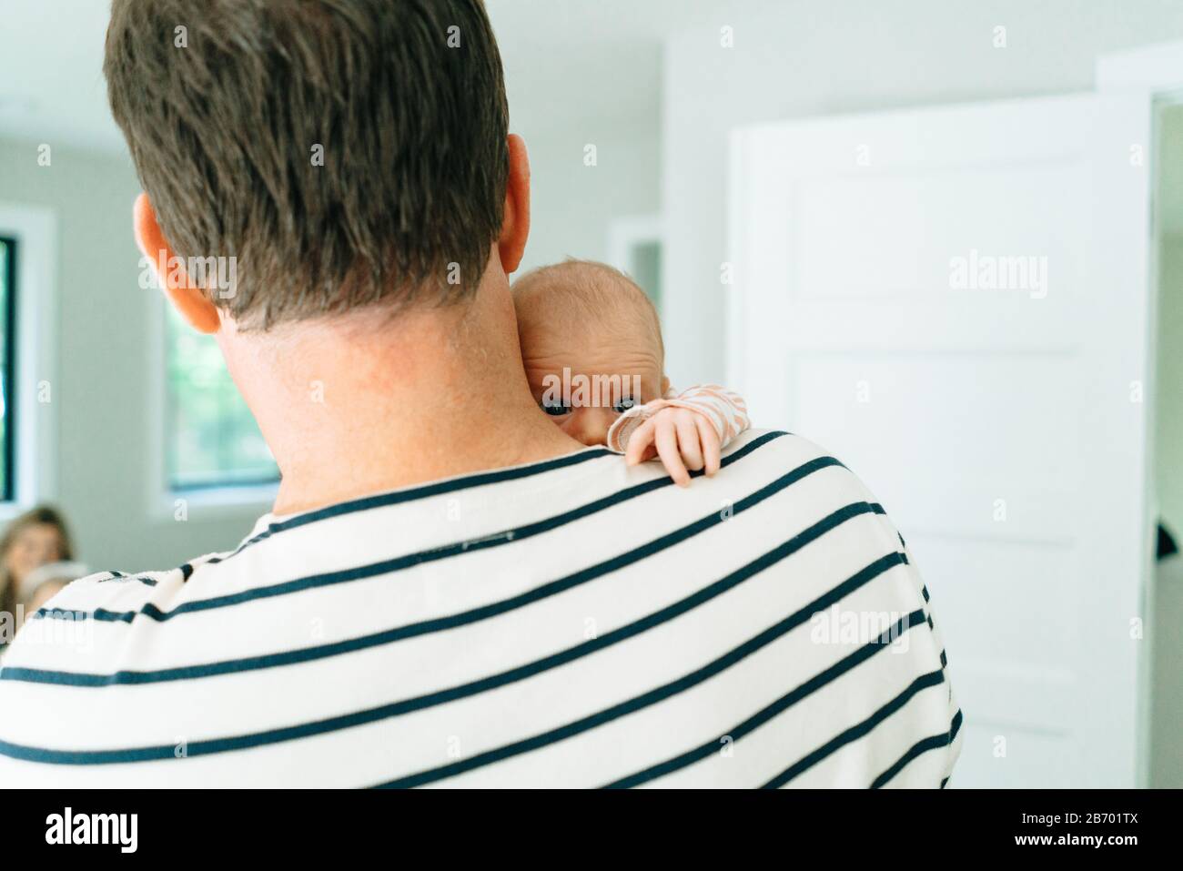 Hugging over shoulder hi-res stock photography and images - Alamy