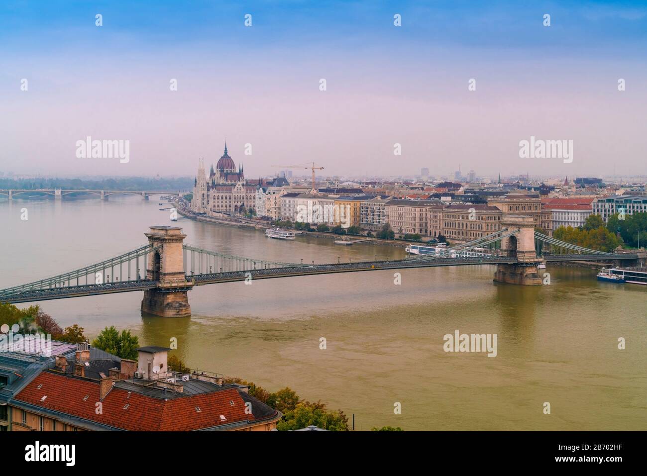 View of the chain bridge, danube river and the parliament palace, Pest ...