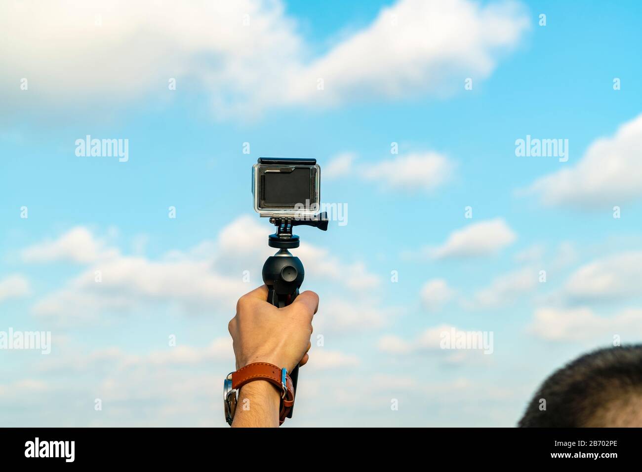 Taking in the action hi-res stock photography and images - Alamy