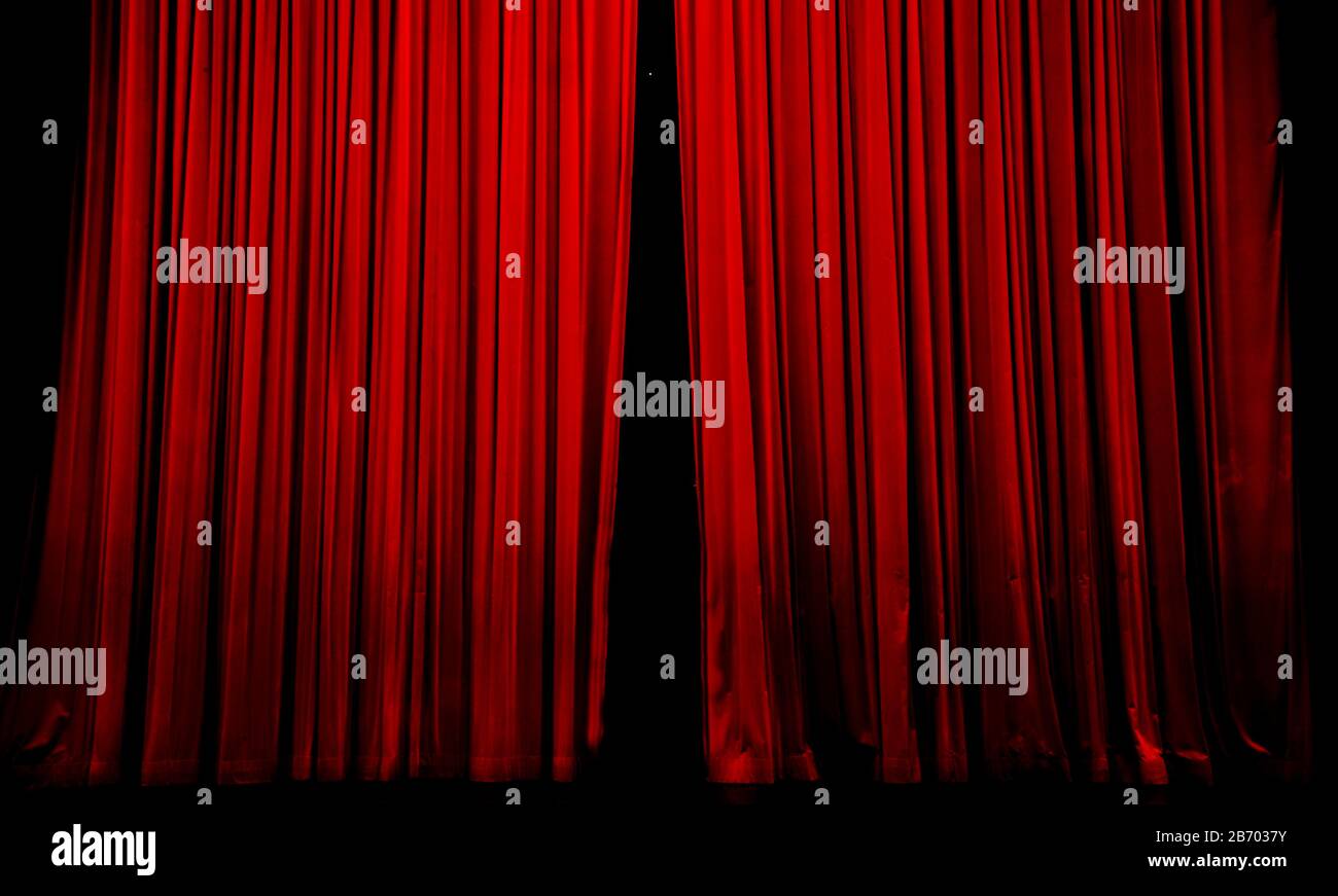 the curtain opens and the show begins Stock Photo - Alamy