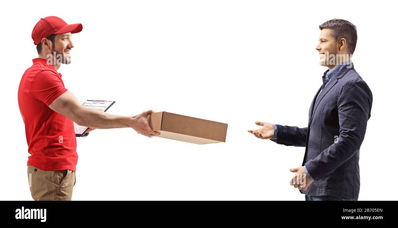 Delivery man giving a package to a young man isolated on white ...