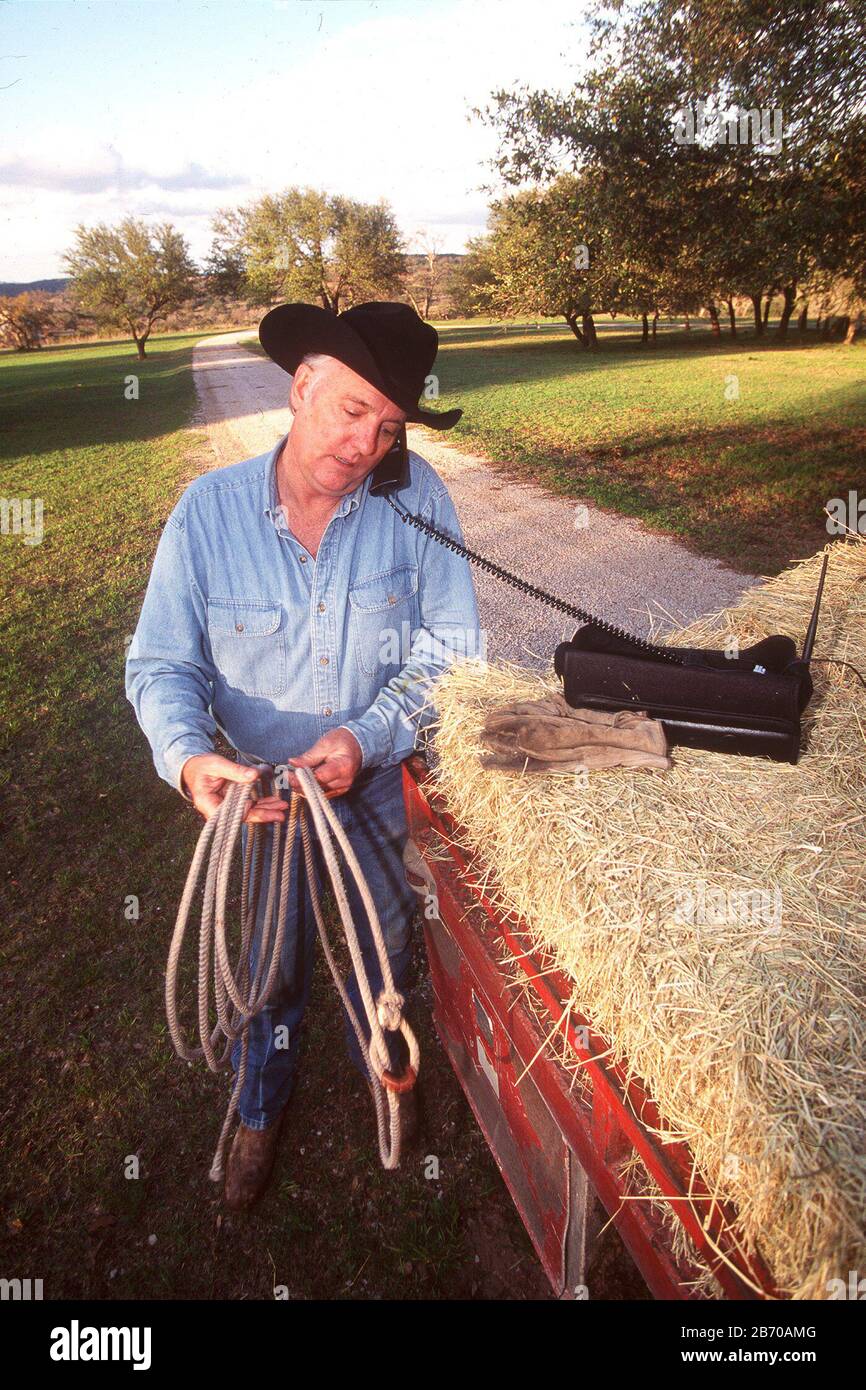 Dripping Springs, Texas USA: Texas rancher uses satellite telephone ...