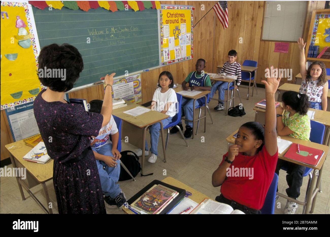 Austin Texas USA: Student-teacher interaction: Fourth grade teacher ...