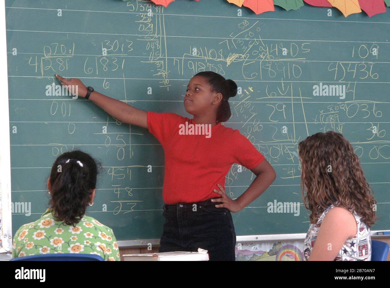 Austin Texas USA: Fifth-grade Black girl explains her long-division ...