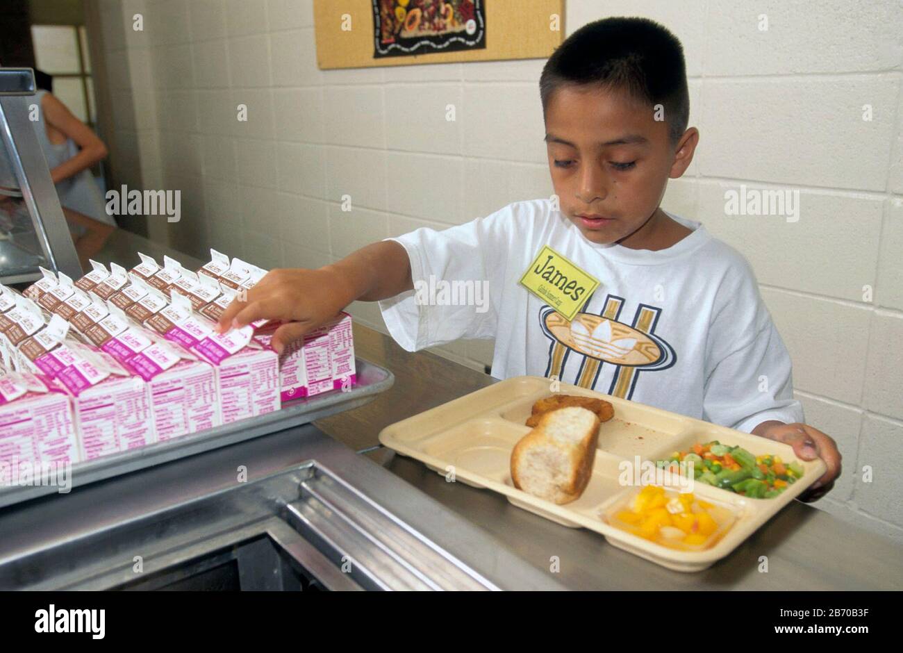 Carton of milk in school cafeteria hi-res stock photography and images ...