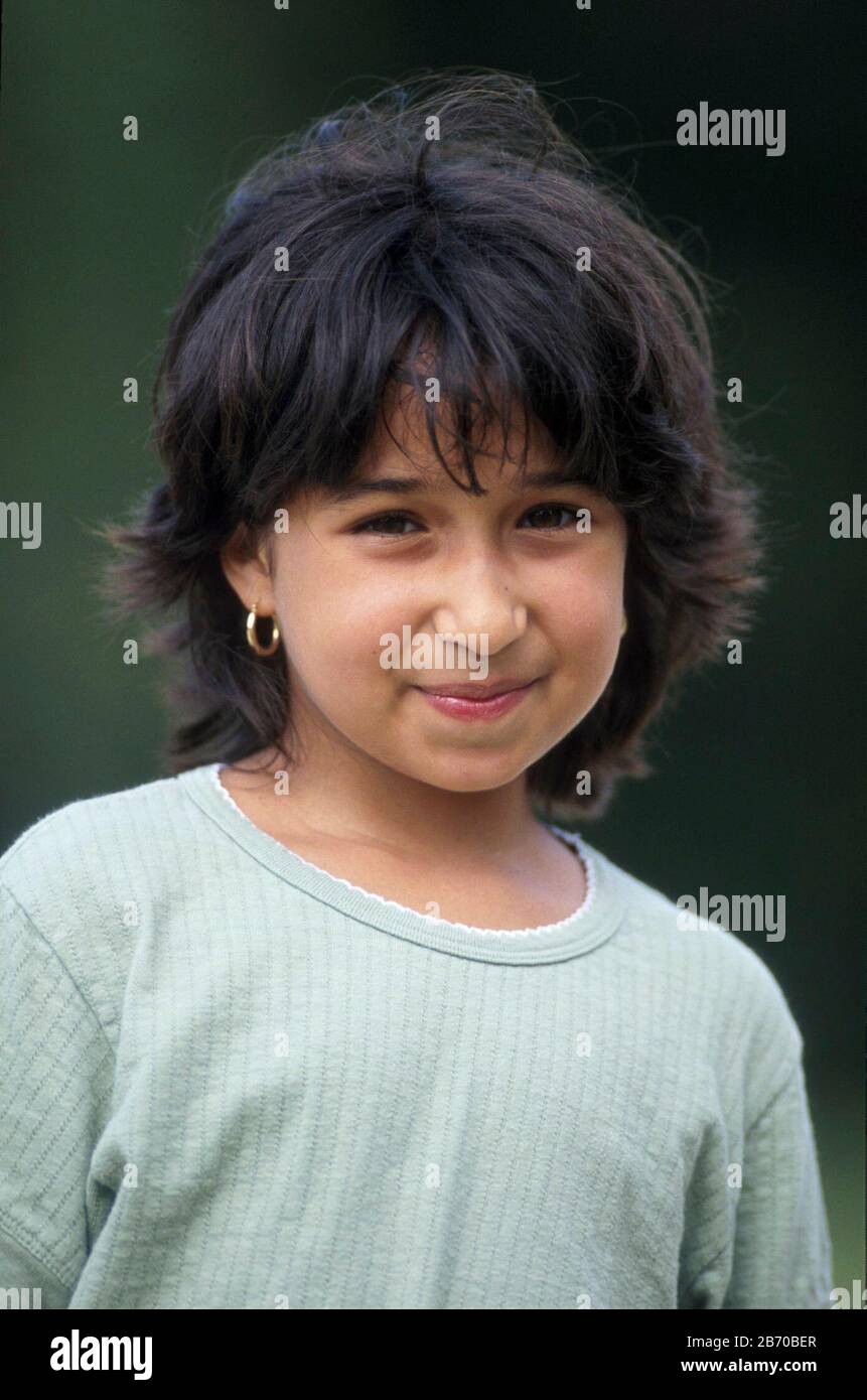 Hispanic girl poses for portrait at school. MR ©Bob Daemmrich Stock ...
