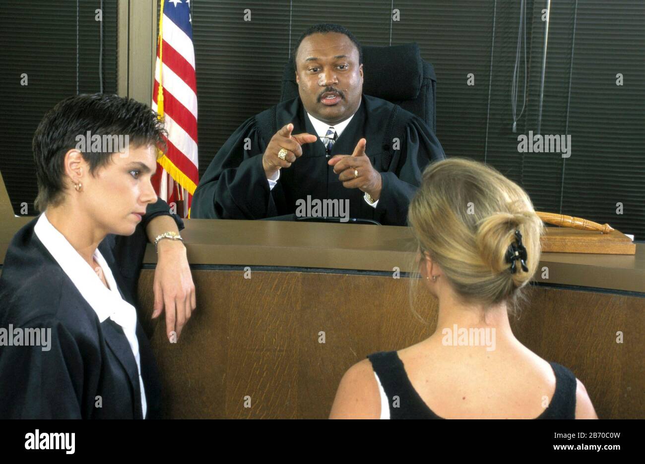 Austin Texas USA, 1997: Male African American judge talks with lawyer ...