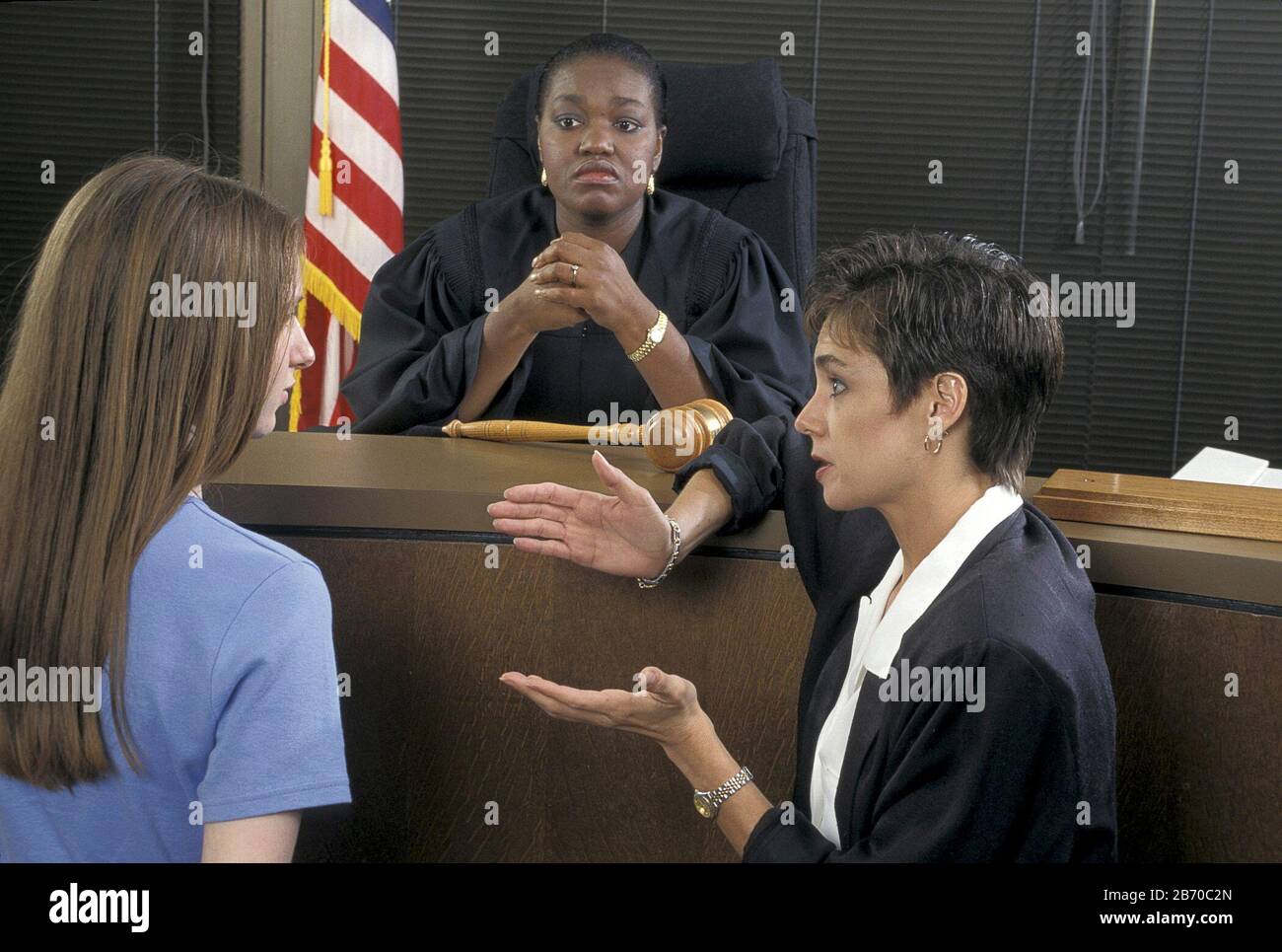 Austin Texas USA, 1997: Hispanic female attorney talks to her client ...