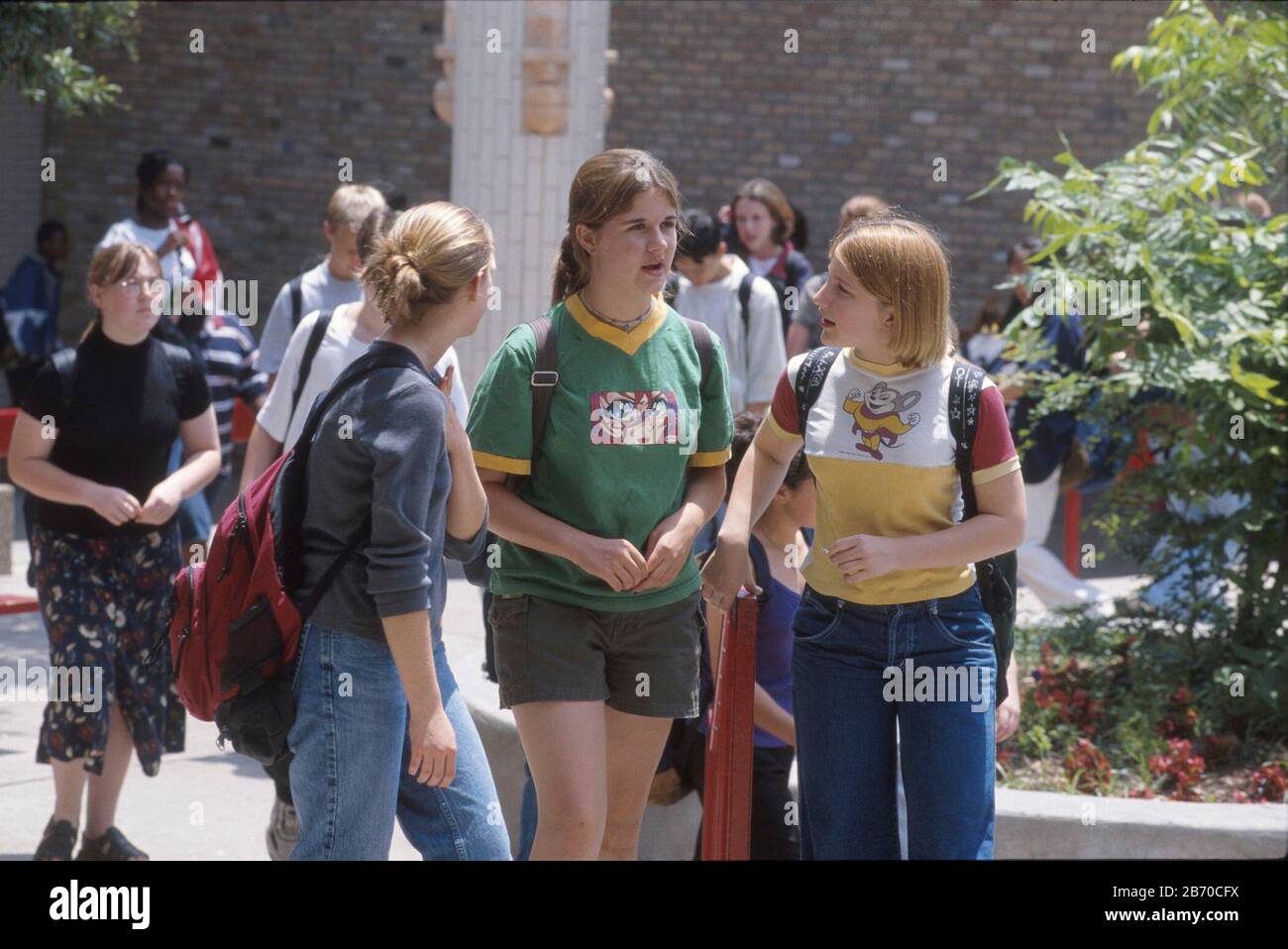 Austin, Texas USA: Junior high students socialize outside during school ...