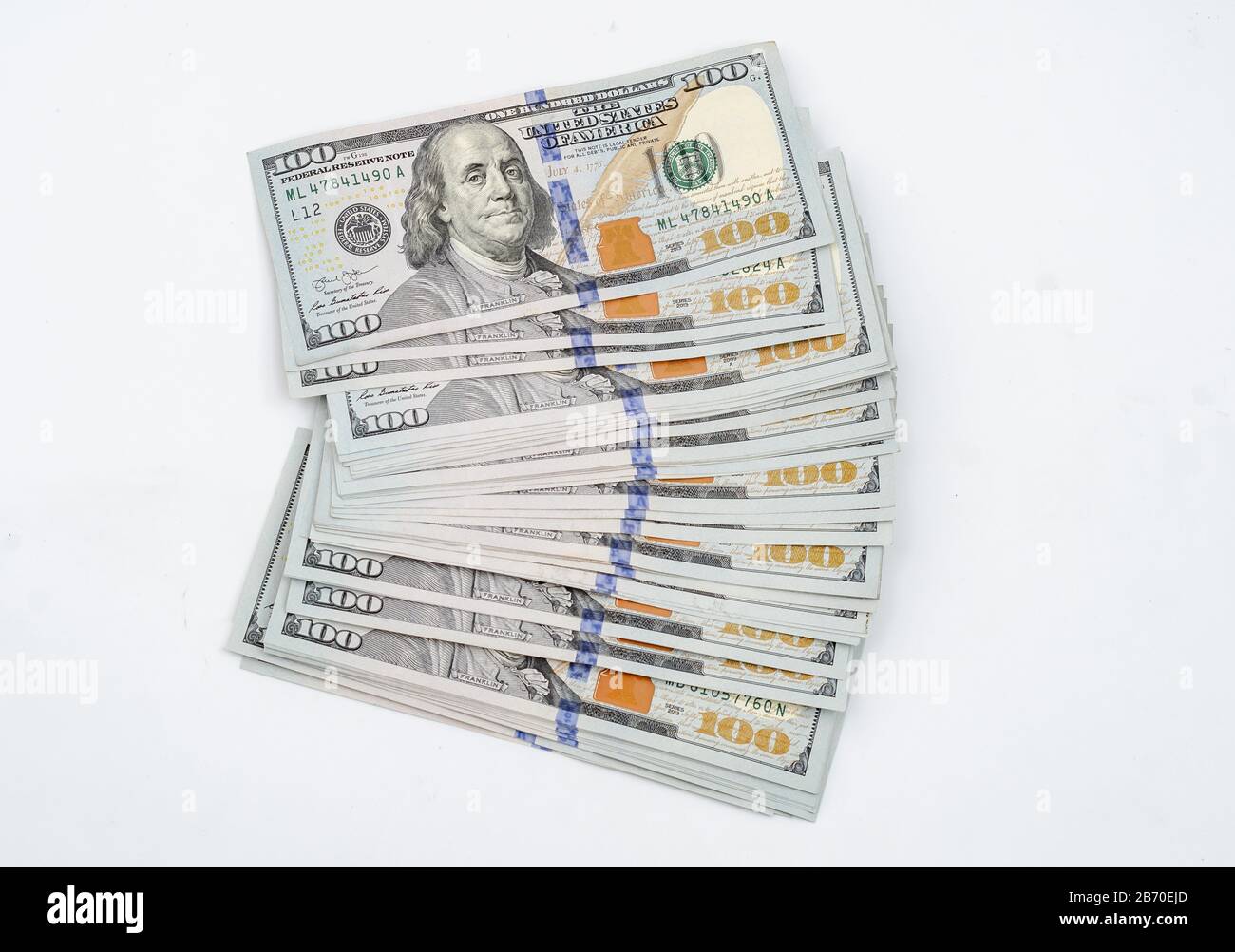 Stack of american dollars. Close-up on a white background Stock Photo ...
