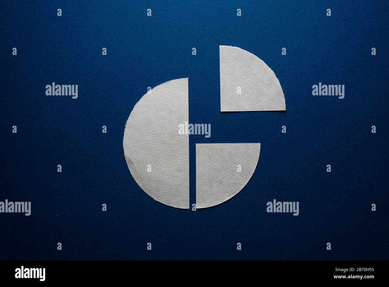 The paper disk is cut into three parts. Concept chart Stock Photo - Alamy