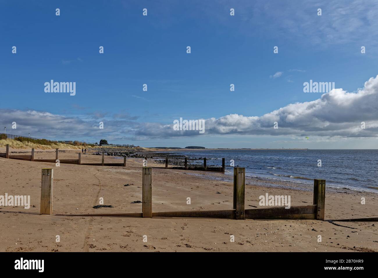 Looking north between the wooden Groynes of Monifieth beach towards ...