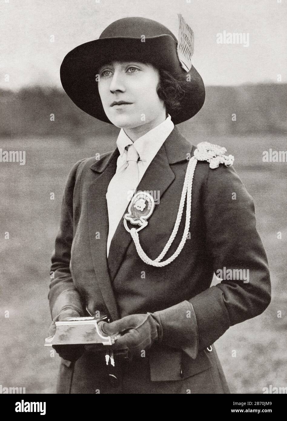 Lady Elizabeth, seen here as District Commissioner of the Girl Guides ...