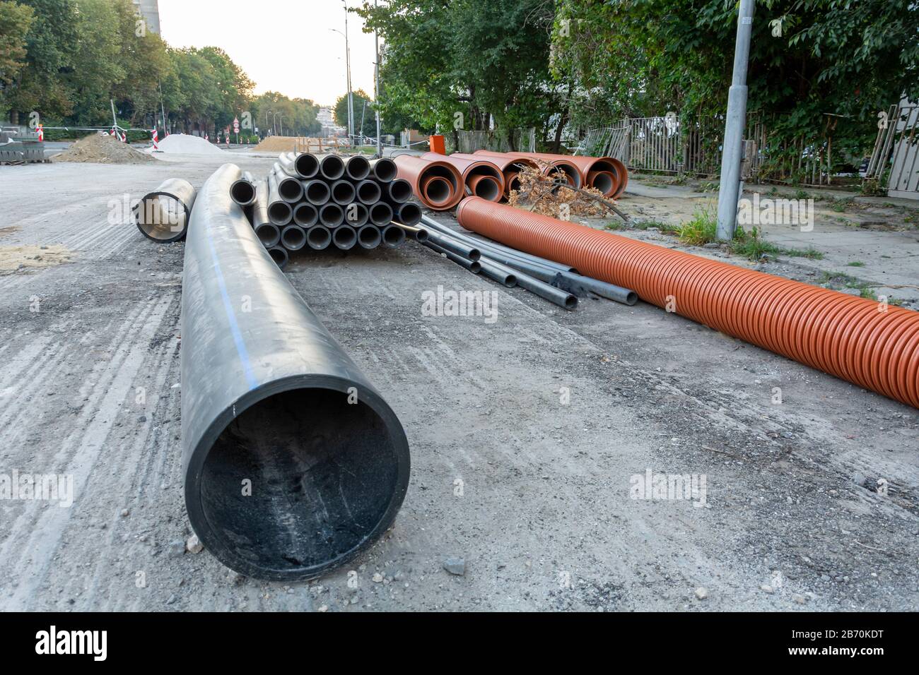 Pvc Pipeline stacked on the road, road construction with pipes Stock ...