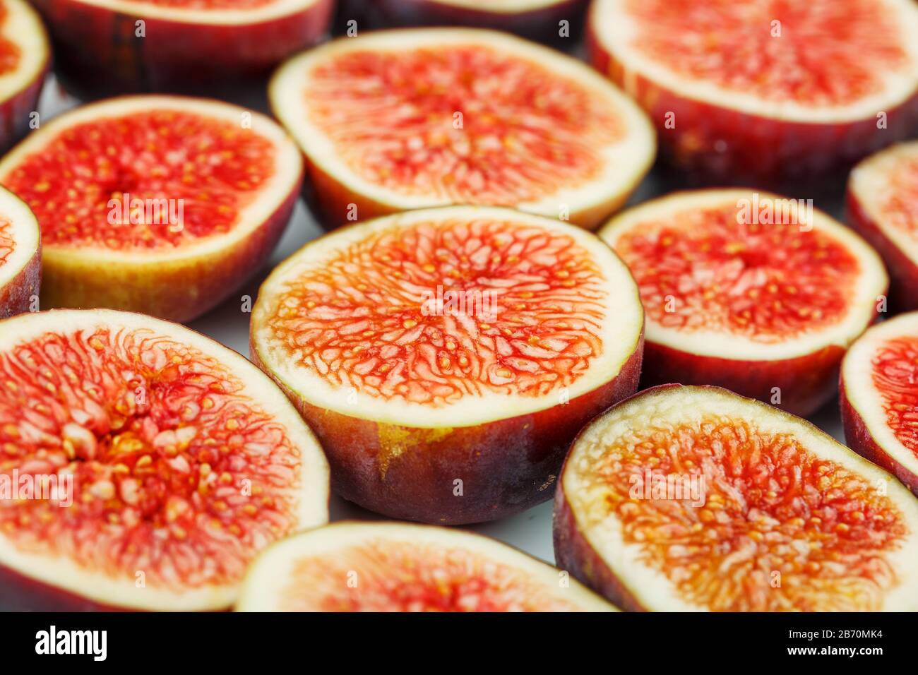 Figs are ripe. Creative diagram of chopped figs on a white background ...