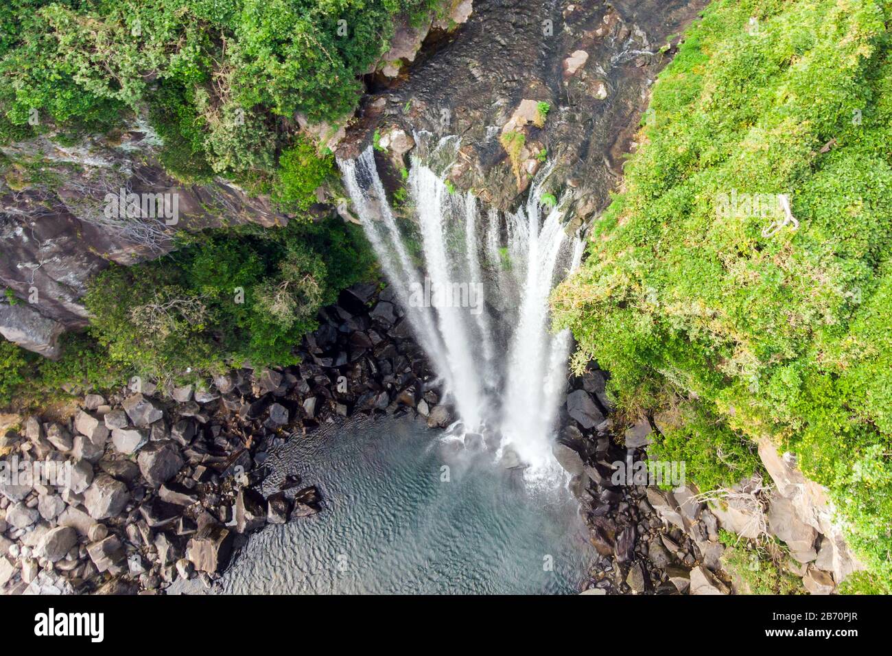 Looking Down Aerial View of The High Waterfall Jeongbang and Lagoon on ...
