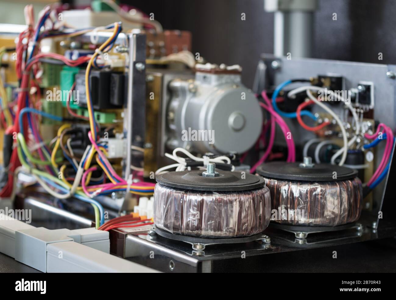 Assembled circuit of electrical relay inside metal case on steel frame ...