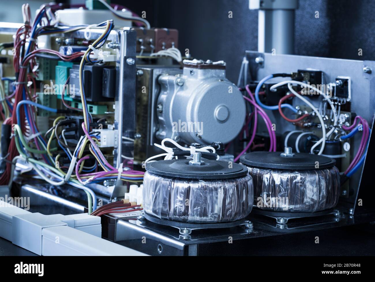 Assembled circuit of electrical relay inside metal case on steel frame ...