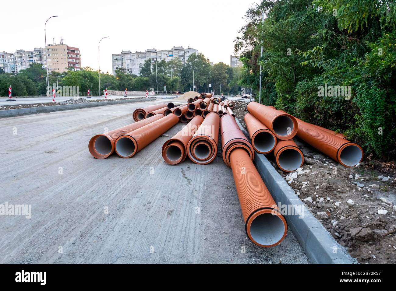 Pvc Pipeline stacked on the road, road construction with pipes Stock ...