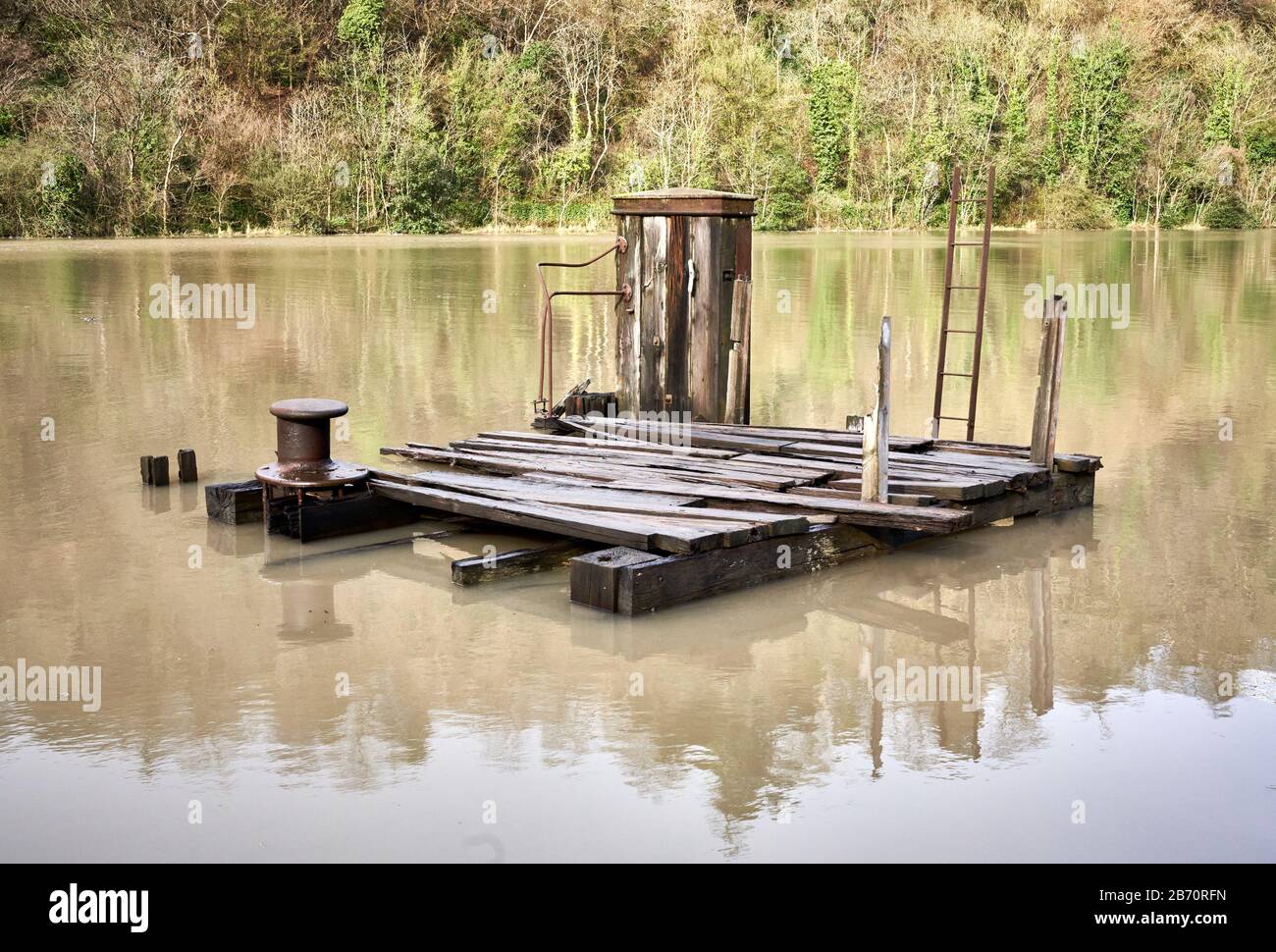 Extreme high tide covering the remains of the derelict paddle steamer ...