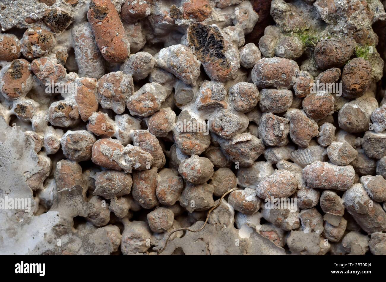 Expanded clay and concrete texture. Concrete wall with voids closeup ...