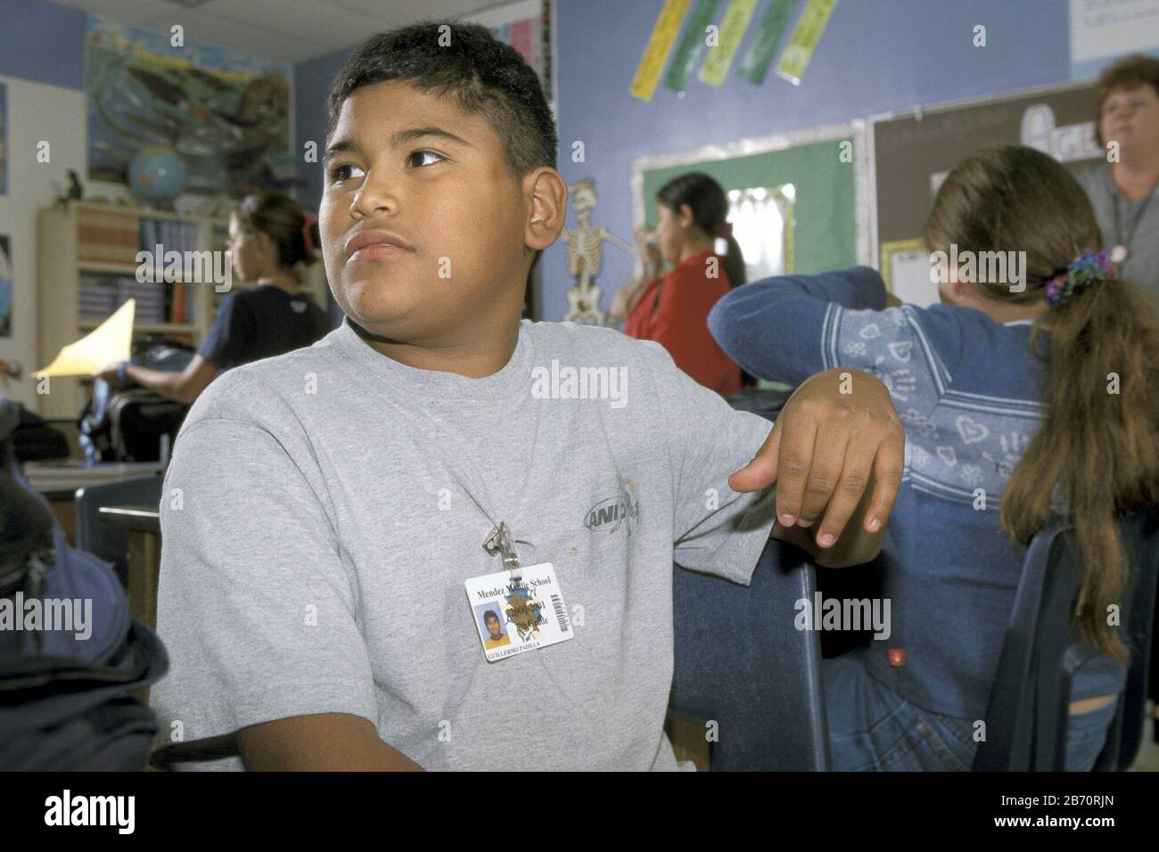 Austin Texas USA: Junior high school student wearing a school-issued ...