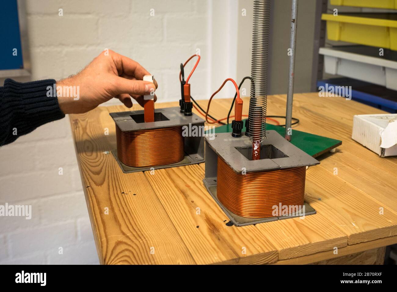 Repetitive movement of the magnet by hand will induce the second magnet ...