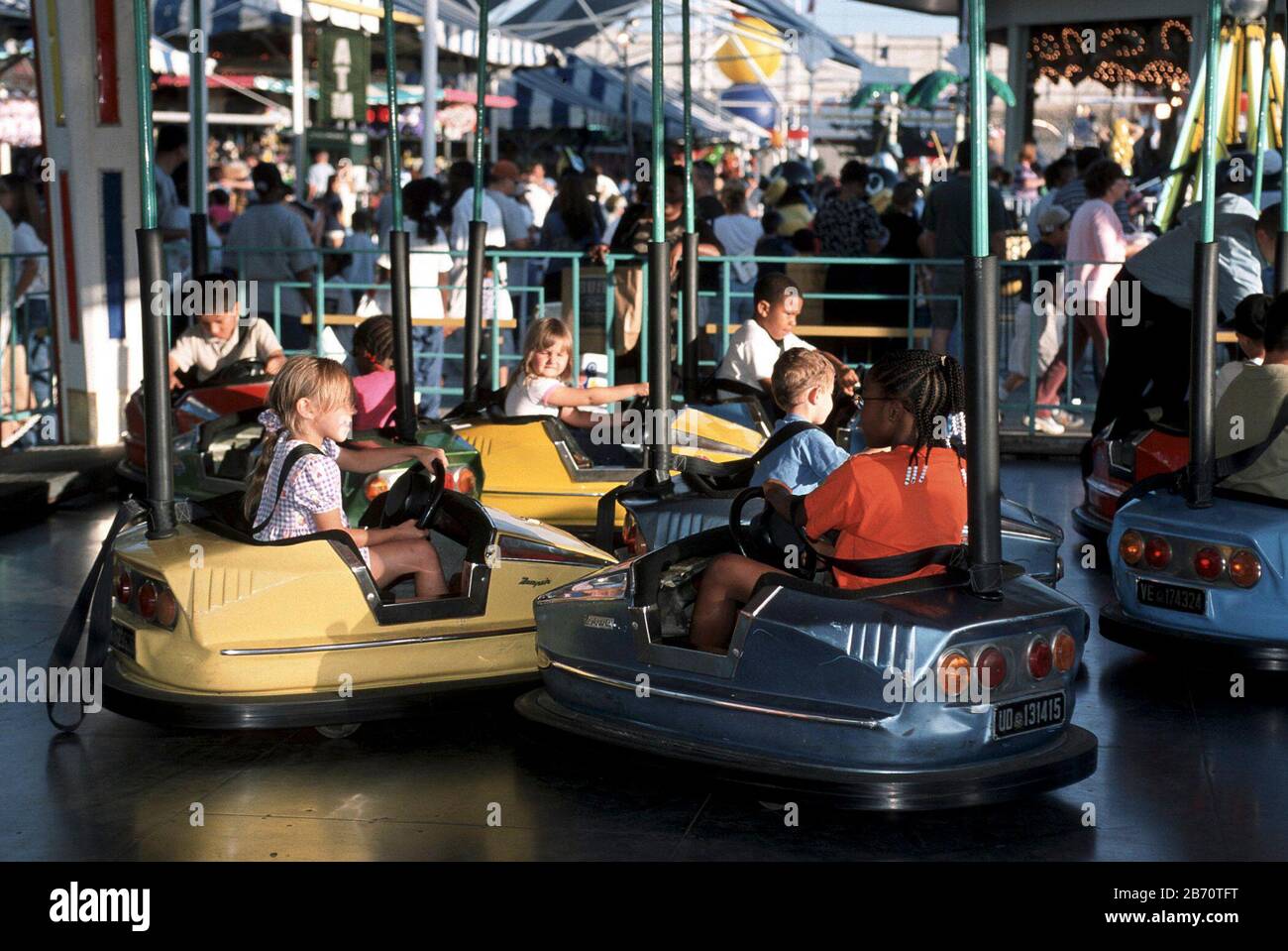 Dallas, Texas USA, 2001: Children ride in bumper cars at State Fair of ...