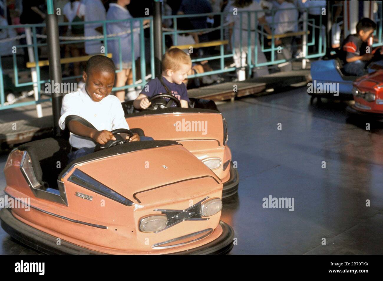 Dallas, Texas USA, 2001: Children ride in bumper cars at State Fair of ...