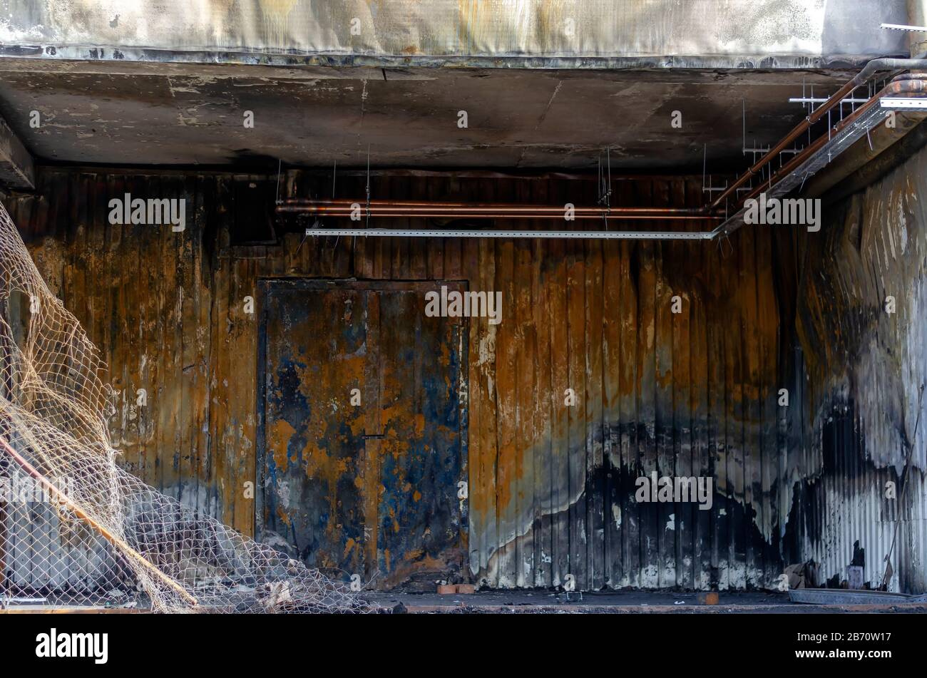 The consequences of a fire in a supermarket (part 1 of 3). Burnt walls ...