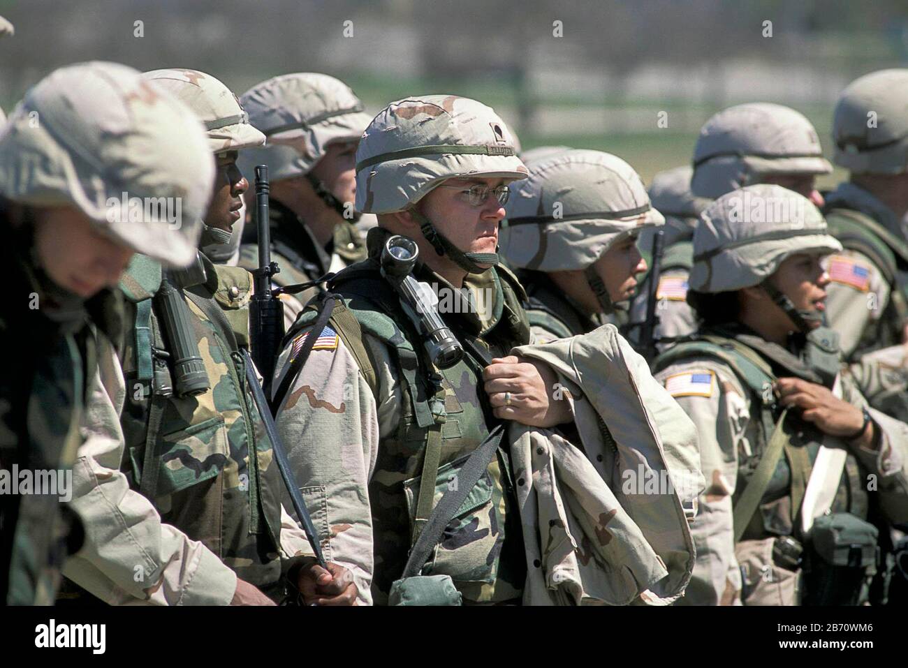 Fort Hood, Texas USA, 2003: Army troops loaded with gear wait to board ...