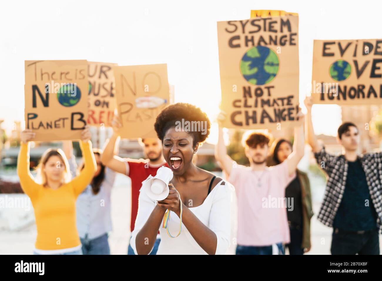 Group demonstrators protesting against plastic pollution and climate ...